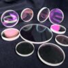 What are the applications of quartz lenses in laser technology?
